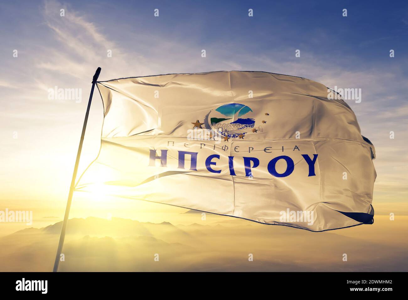 Epirus region of Greece flag waving on the top sunrise mist fog Stock ...