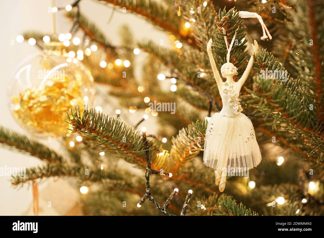 Beautiful ballerina decorates a Christmas tree branch. Festive ...