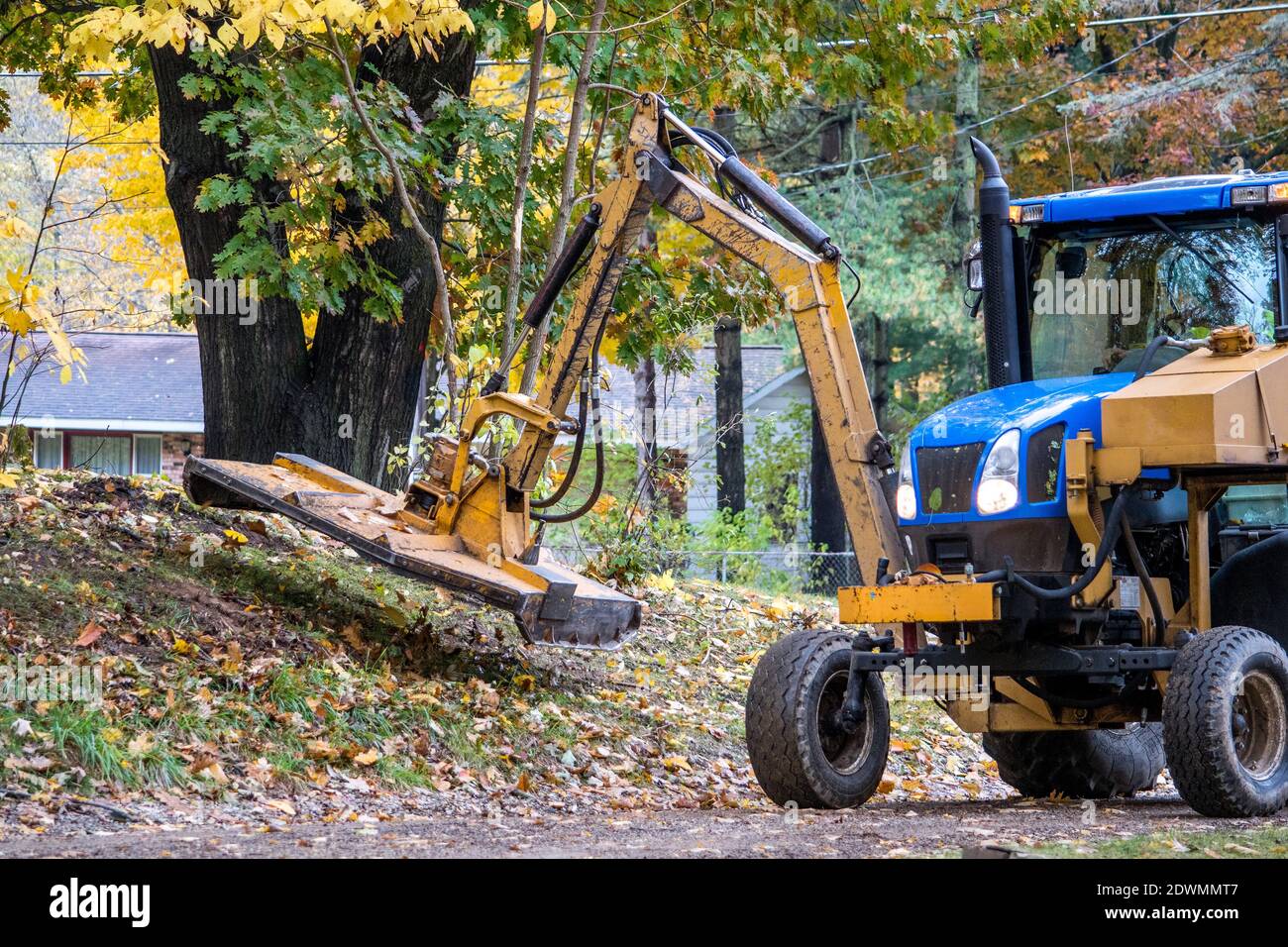 Large Tractor With A Side Mower Deck, Trims Down Grass And Brush Along ...