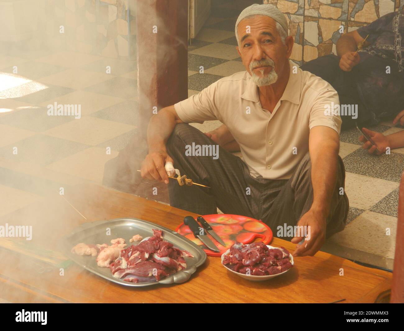 Indian man selling meat hi-res stock photography and images - Alamy