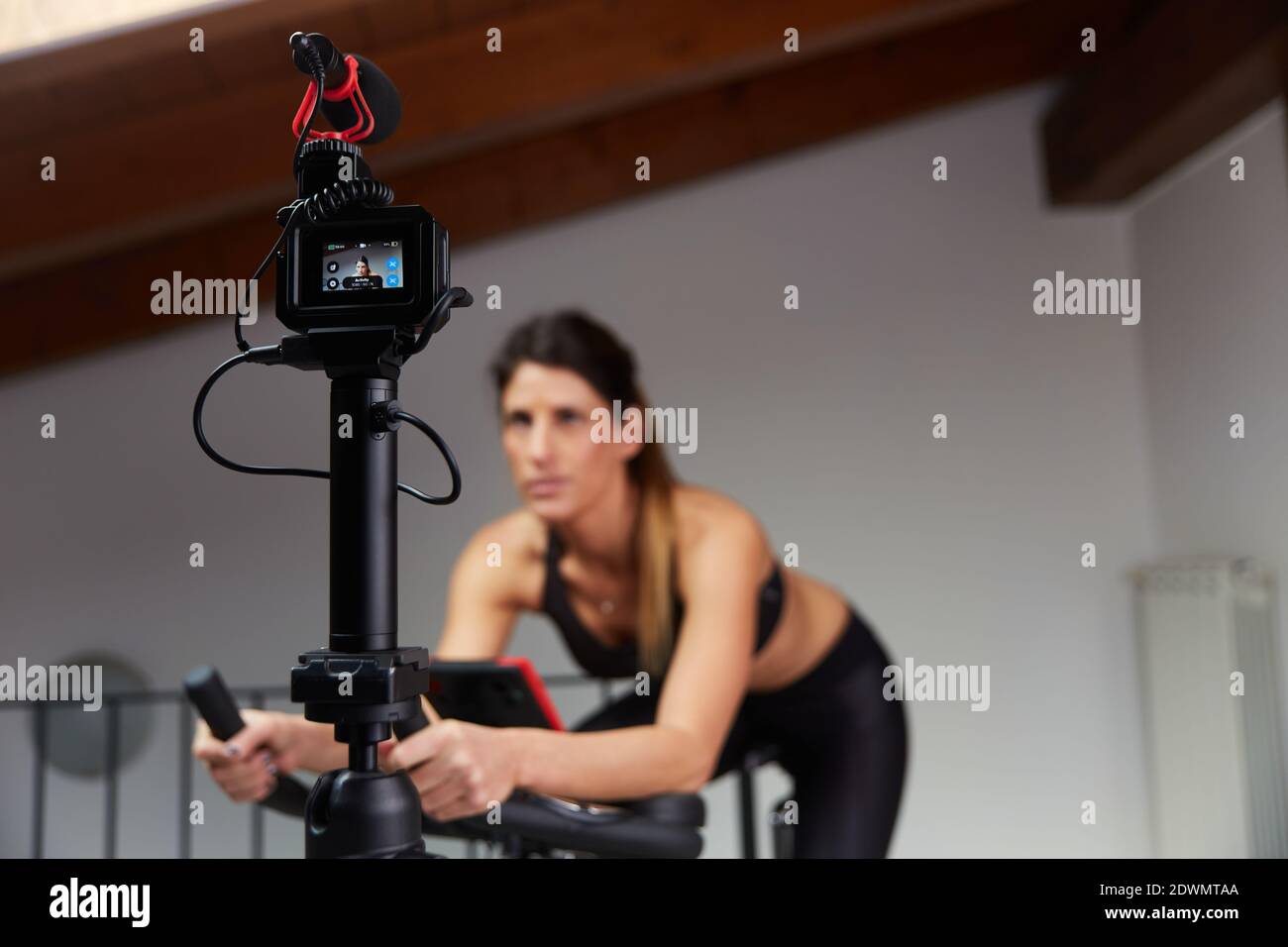 Vlogger recording spinning lesson Stock Photo - Alamy