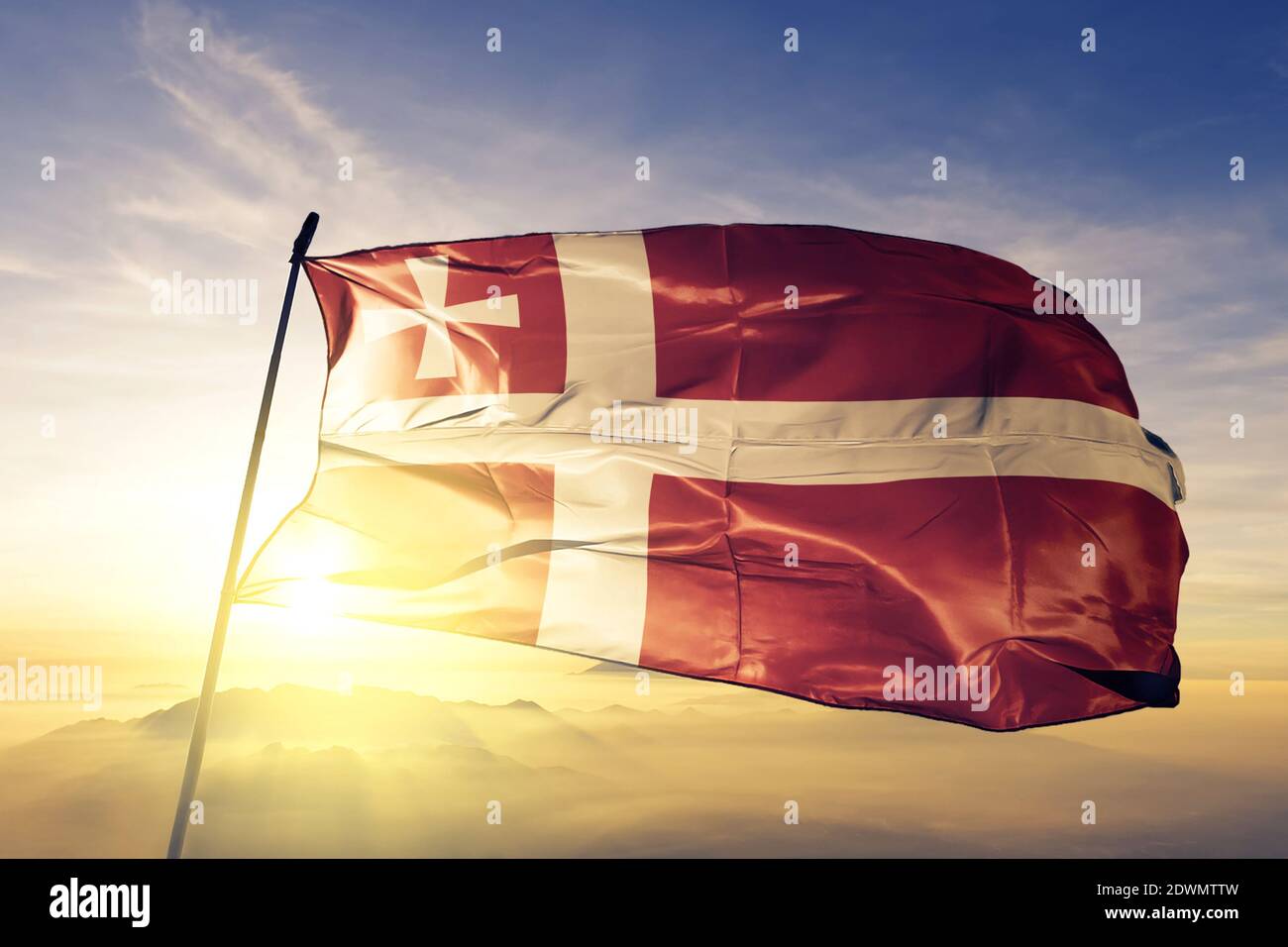 Volyn oblast of Ukraine flag waving on the top sunrise mist fog Stock ...