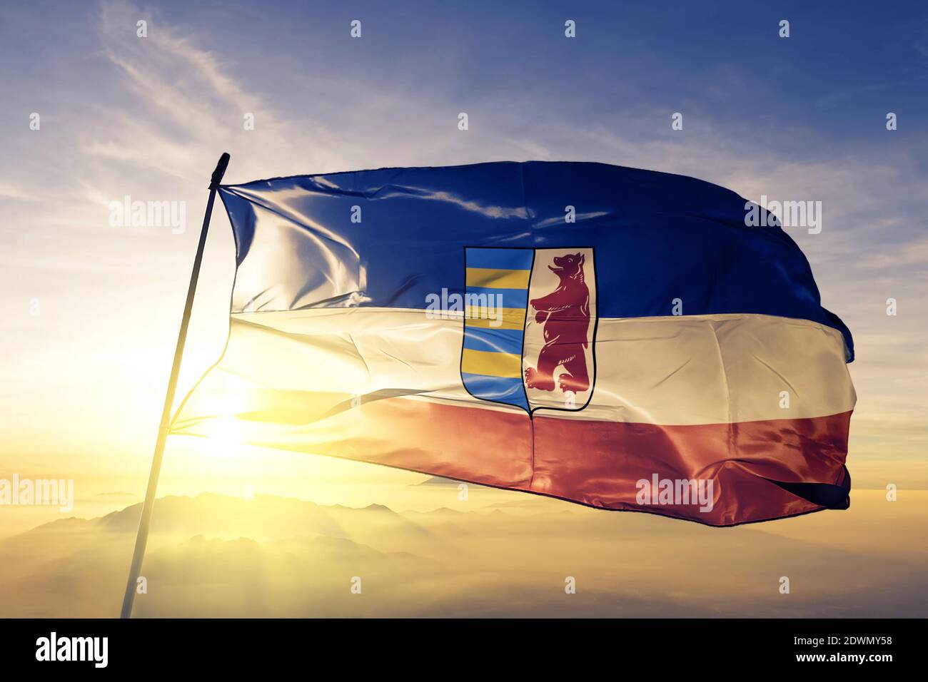 Carpathian Ruthenia Carpatho-Rusyns flag waving on the top sunrise mist ...