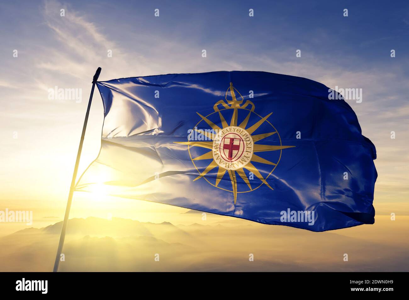 Anglican Communion flag waving on the top sunrise mist fog Stock Photo ...