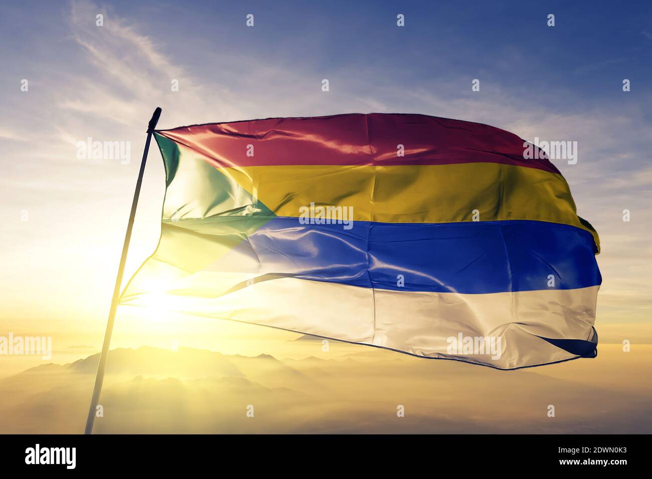 Druze flag waving on the top sunrise mist fog Stock Photo - Alamy