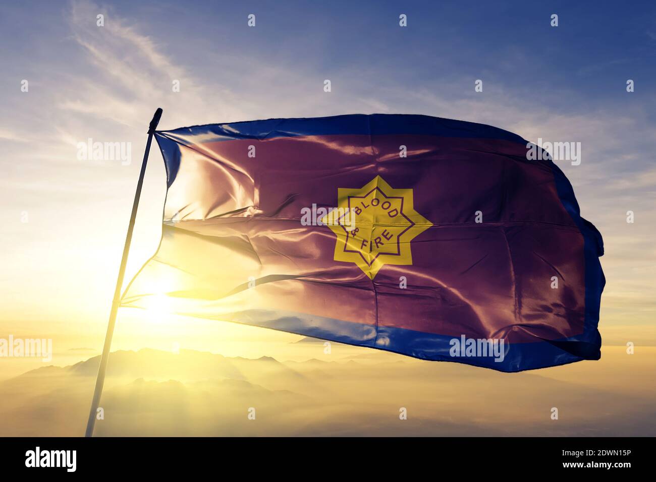 Standard of The Salvation Army flag waving on the top sunrise mist fog ...