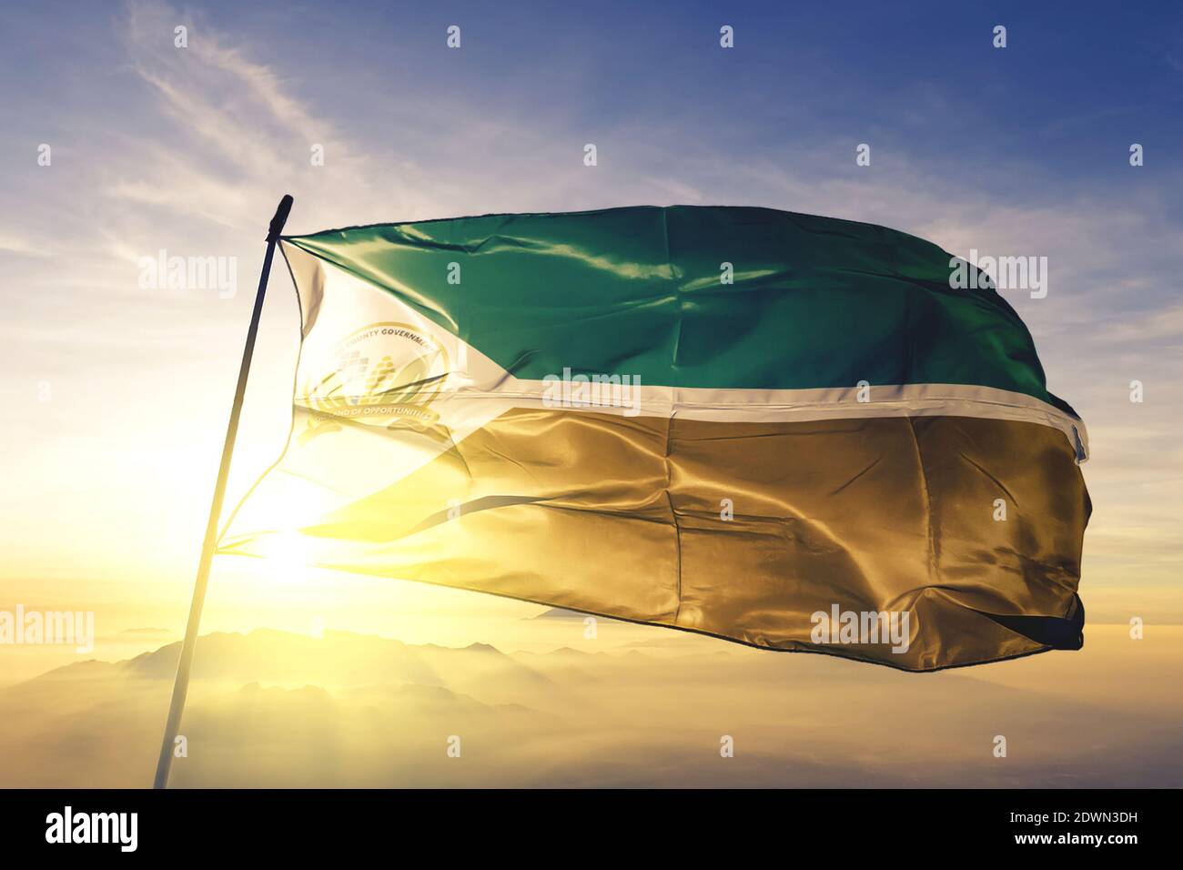 Embu county of Kenya flag waving on the top sunrise mist fog Stock ...