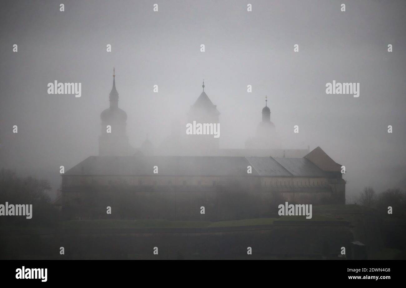 23 December 2020, Bavaria, Würzburg: The towers of the Marienberg ...