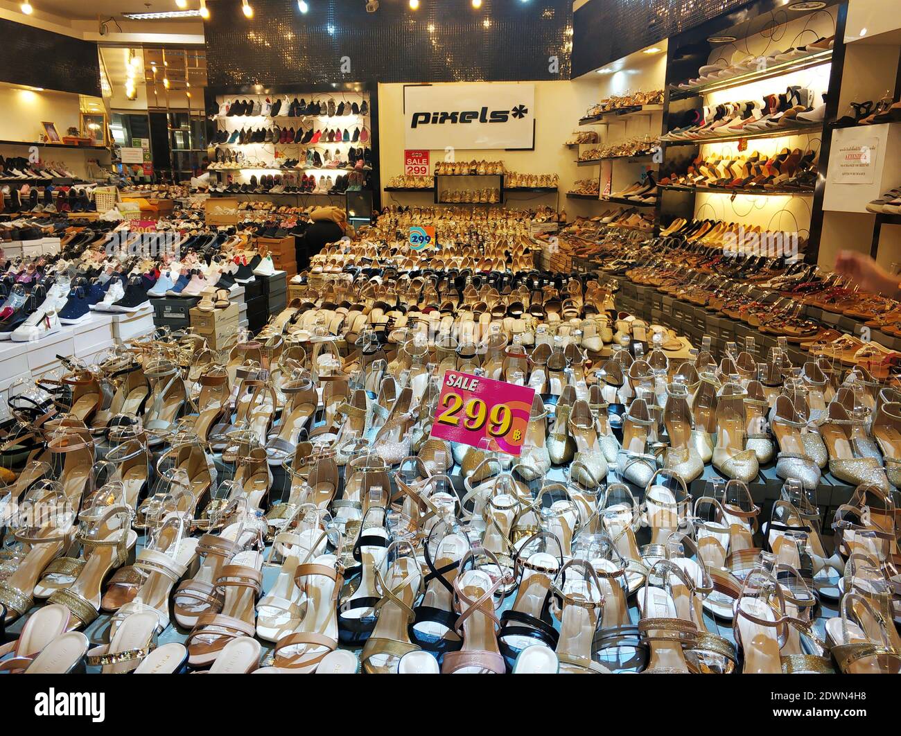 Sale of women's sandals in a Thai shoe store Stock Photo - Alamy
