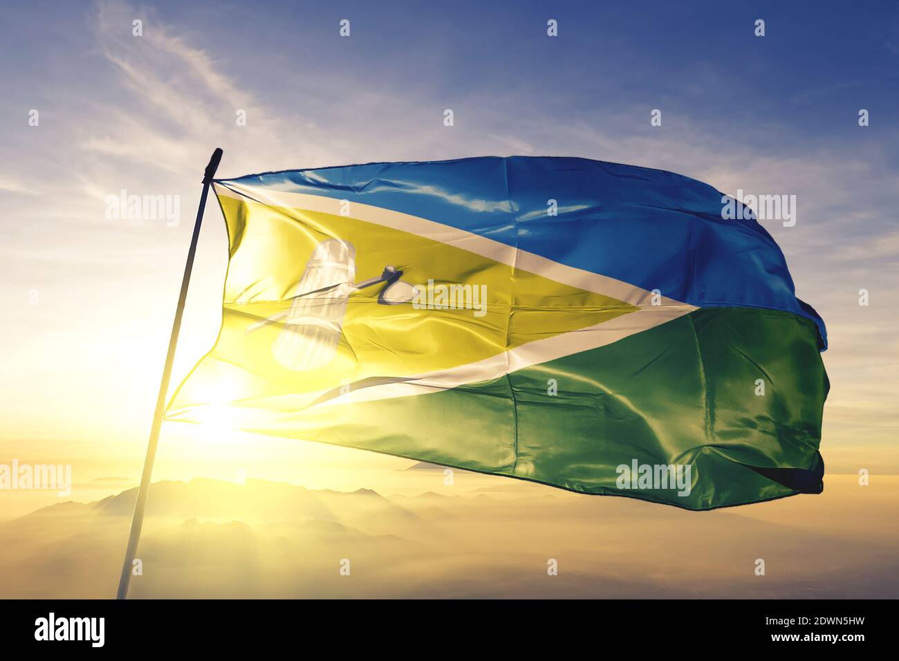 Isabel province of Solomon Islands flag waving on the top sunrise mist ...