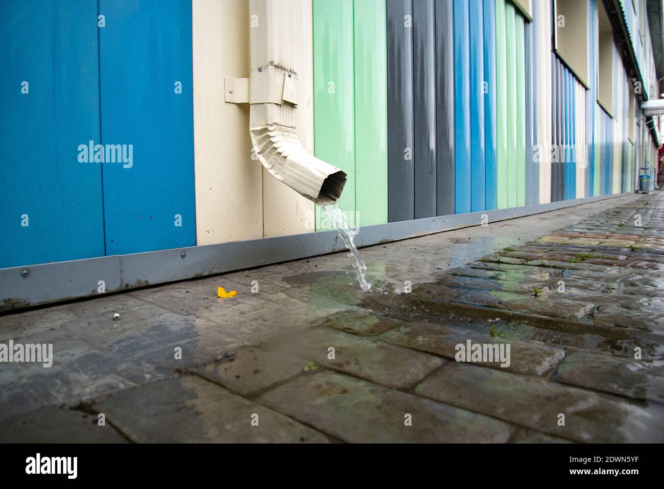 Rainwater Flows From the Roof of the Building Through a Drain. Removal ...