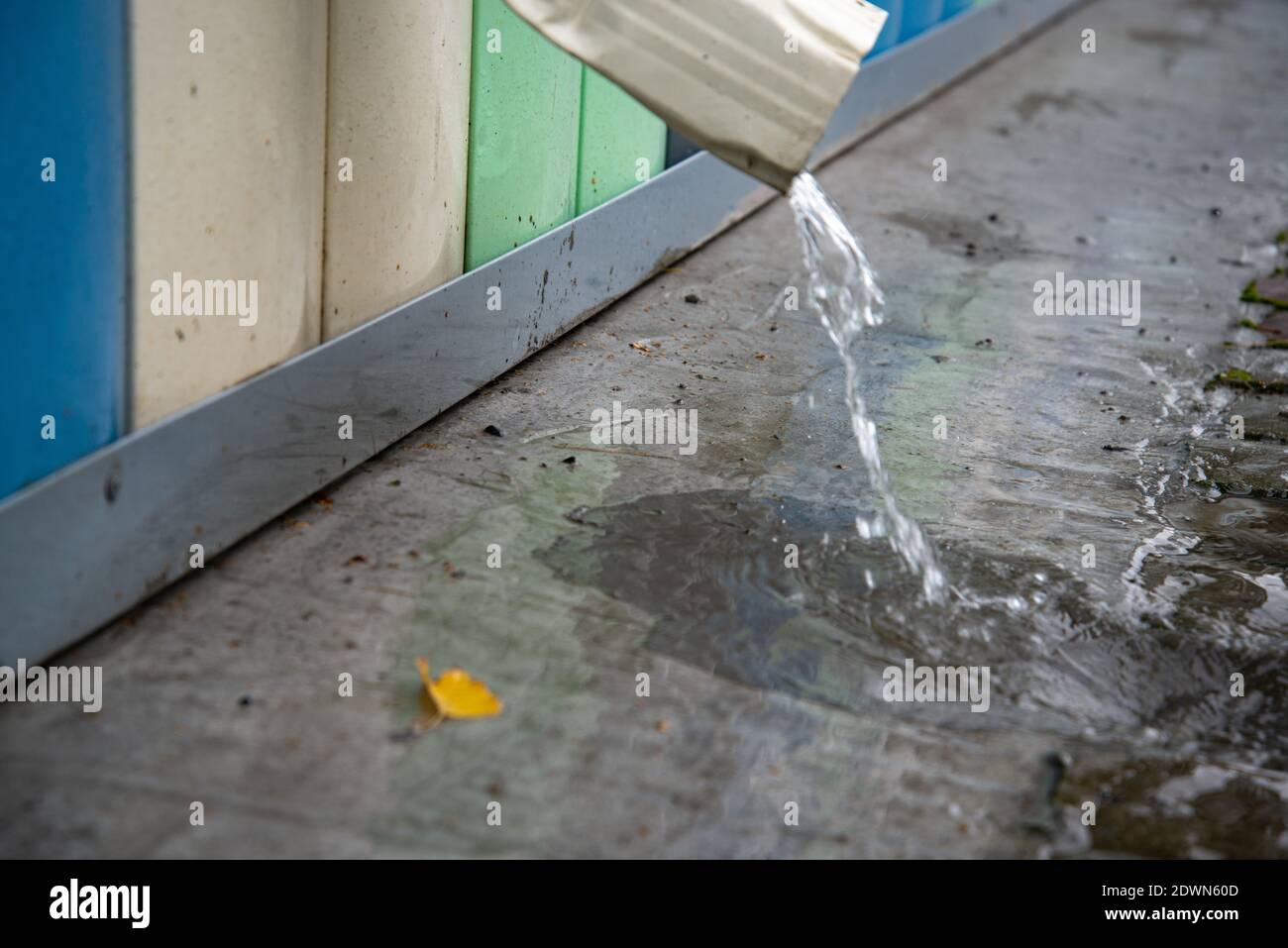 Rainwater Flows From the Roof of the Building Through a Drain. Removal ...