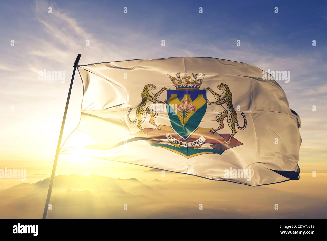 Free State province of South Africa flag waving on the top sunrise mist ...