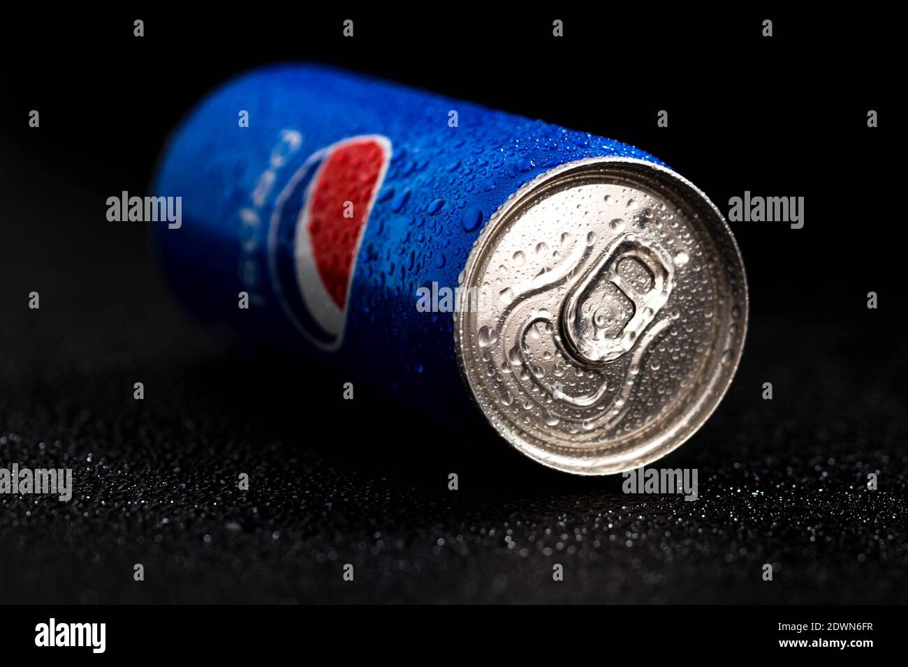 Editorial photo of Pepsi can with water droplets on black background ...