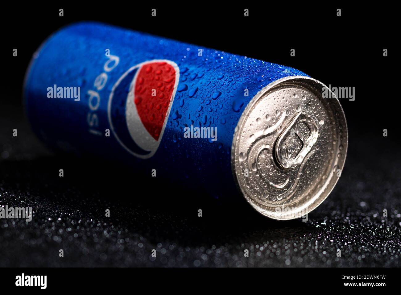 Editorial photo of Pepsi can with water droplets on black background ...