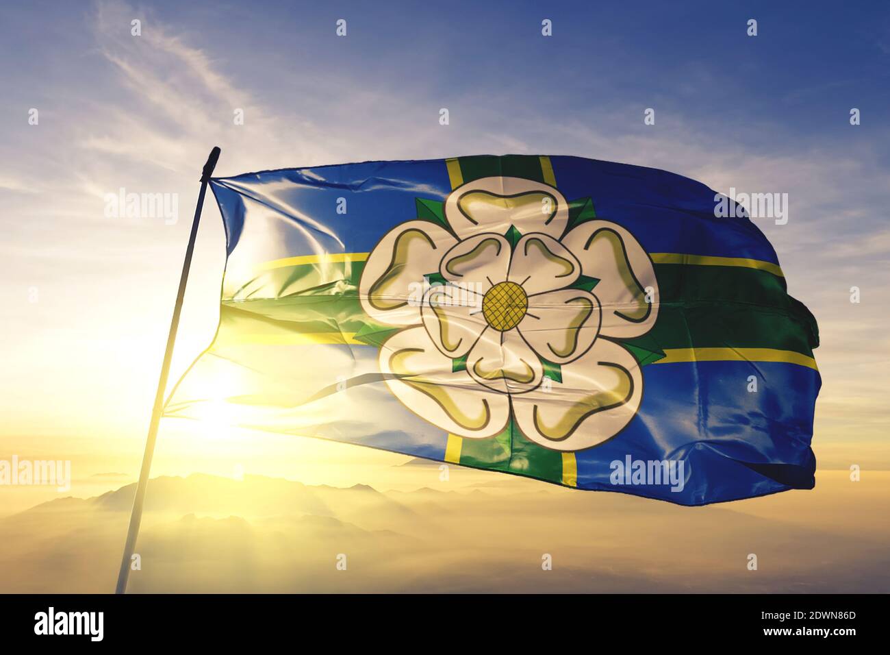 North Yorkshire North Riding county flag waving on the top sunrise mist ...