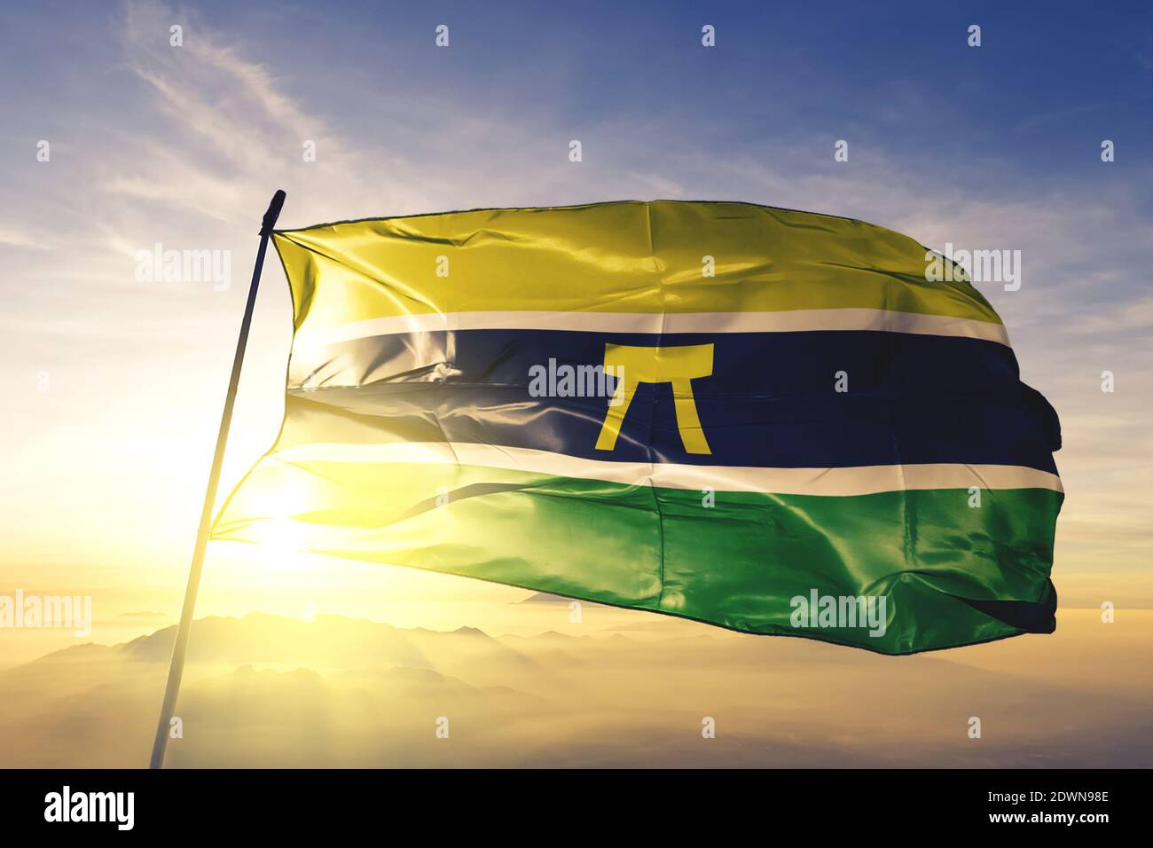 Ashanti region of Ghana flag waving on the top sunrise mist fog Stock ...