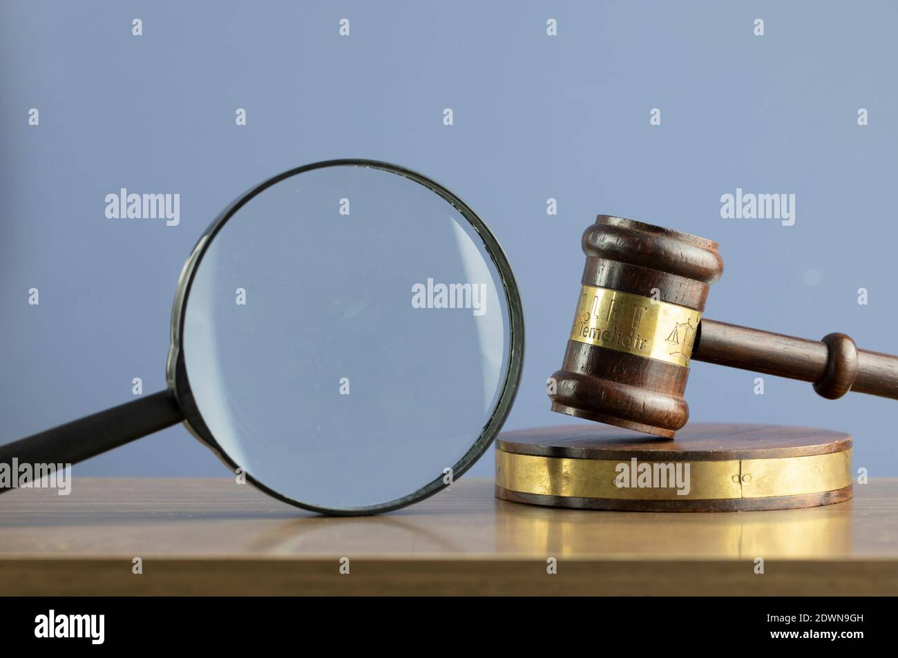 Law Concept, Magnifying glass and judge hammer Stock Photo - Alamy