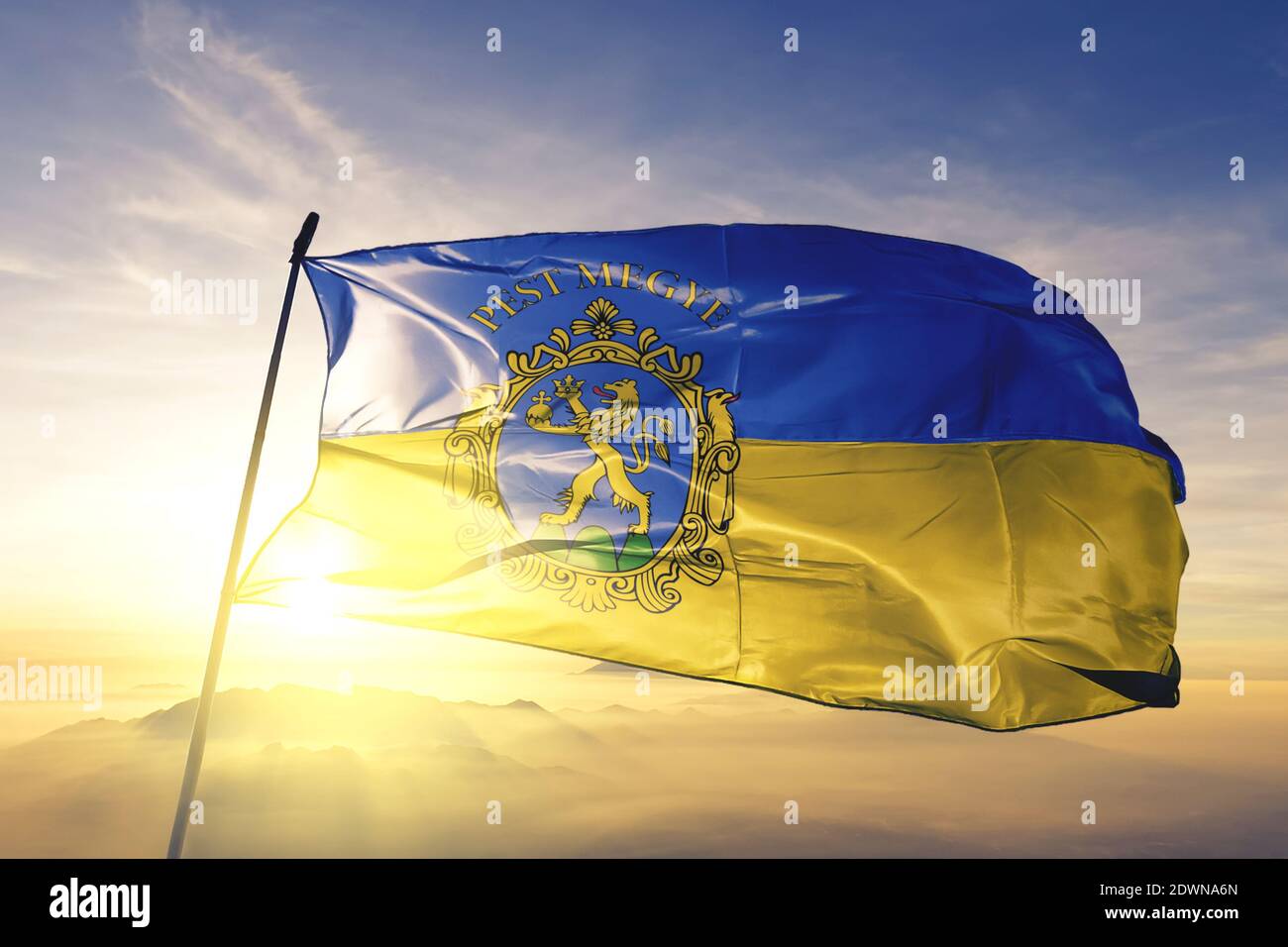 Pest county of Hungary flag waving on the top sunrise mist fog Stock ...