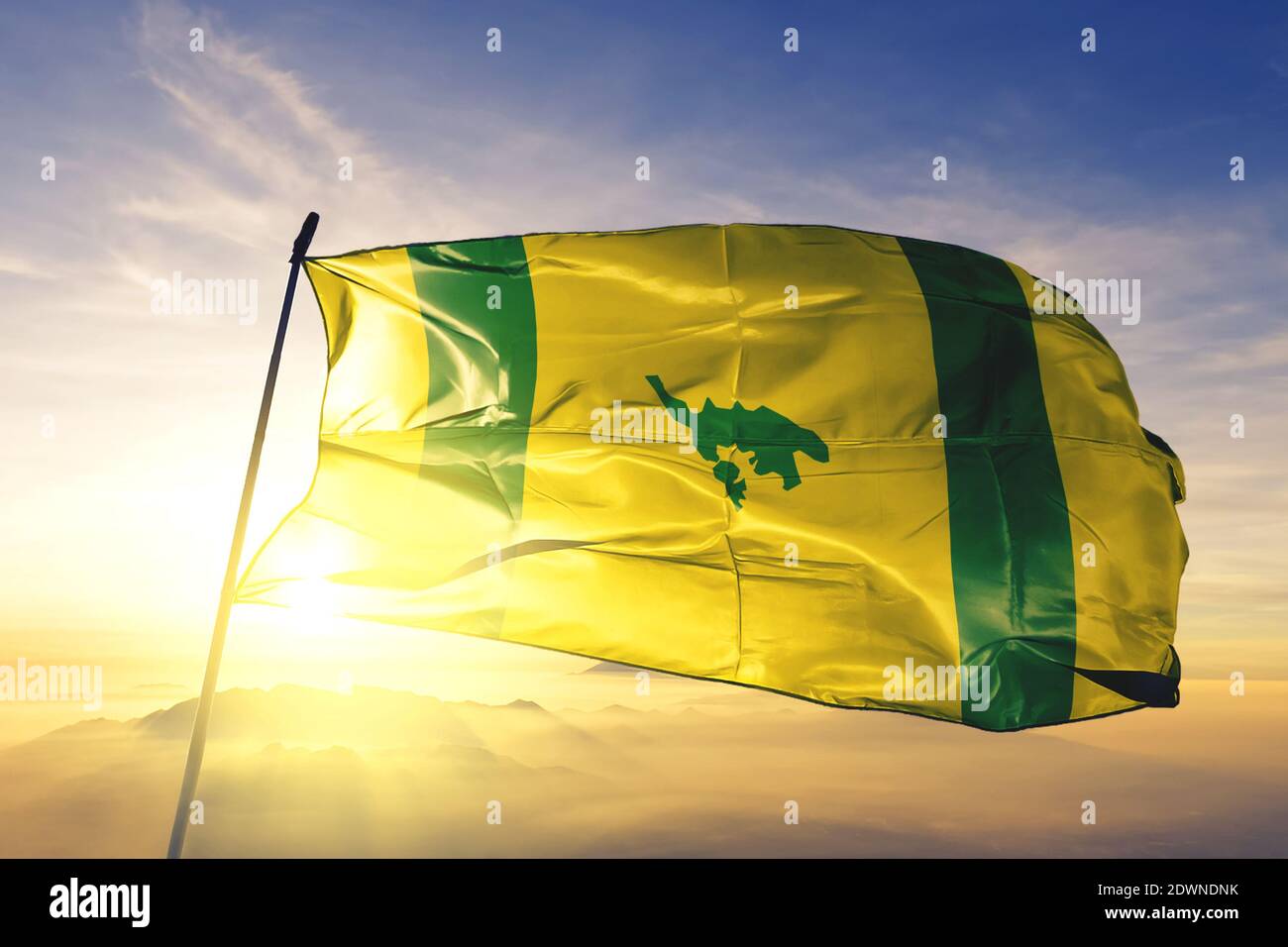 Culebra municipality of Puerto Rico flag waving on the top sunrise mist ...