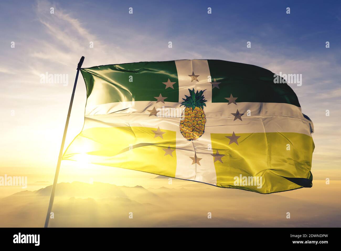 Lajas municipality of Puerto Rico flag waving on the top sunrise mist ...