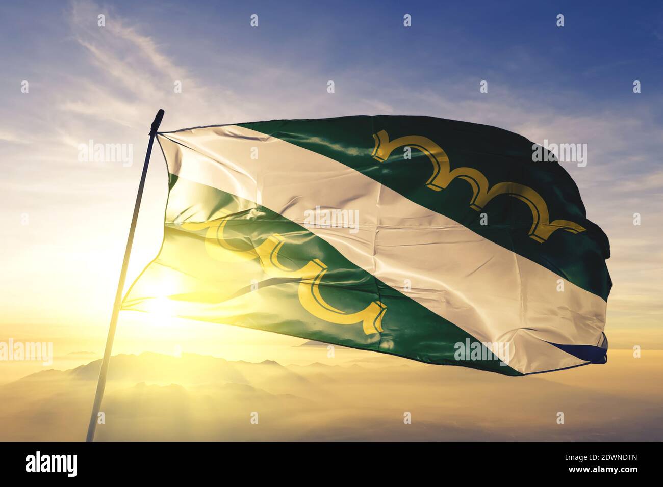 Maunabo municipality of Puerto Rico flag waving on the top sunrise mist ...