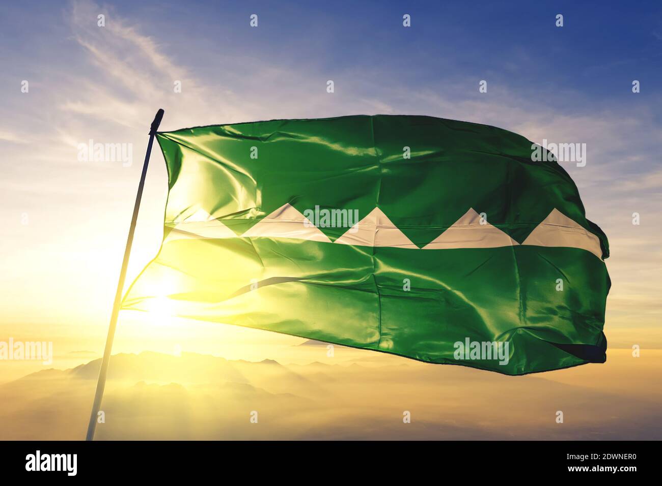 Salinas municipality of Puerto Rico flag waving on the top sunrise mist ...