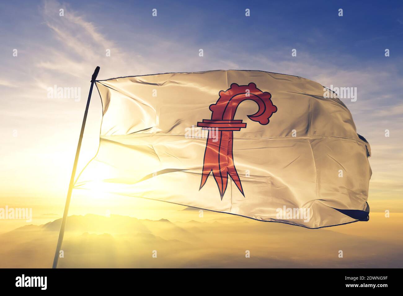 Basel Land canton of Switzerland flag waving on the top sunrise mist ...