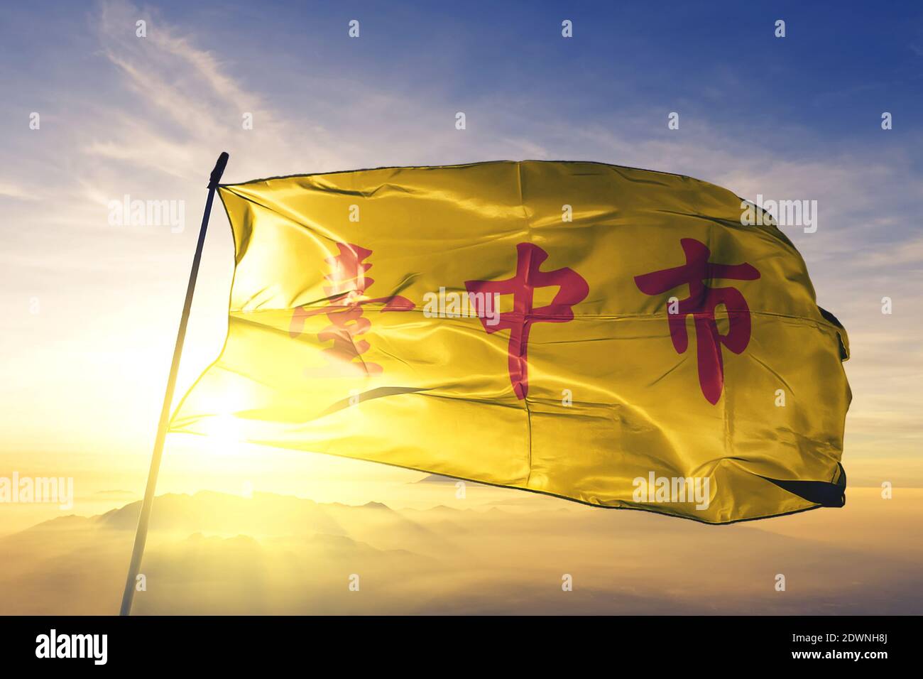 Taichung city of Taiwan flag waving on the top sunrise mist fog Stock ...