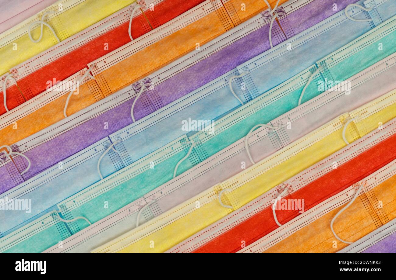 surgical masks of different colors. medical background. multicolored ...