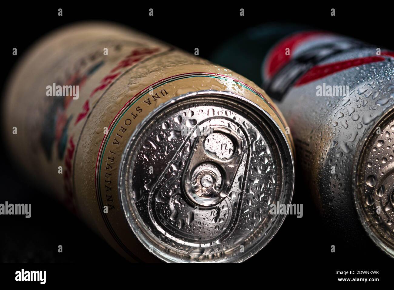 Condensation water droplets on beer cans isolated on black. Bucharest ...