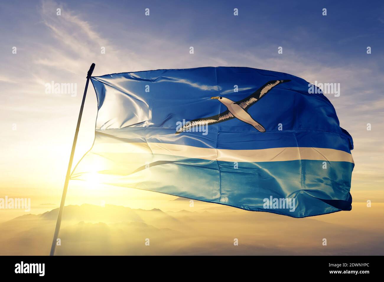 Midway Islands flag waving on the top sunrise mist fog Stock Photo - Alamy