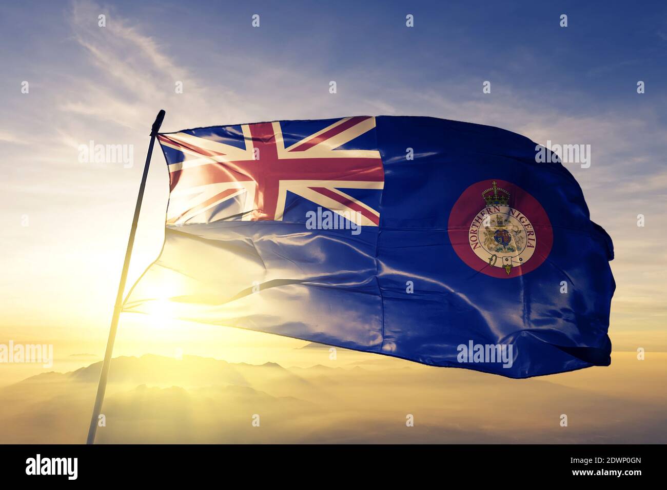 Northern Nigeria Protectorate flag waving on the top sunrise mist fog ...