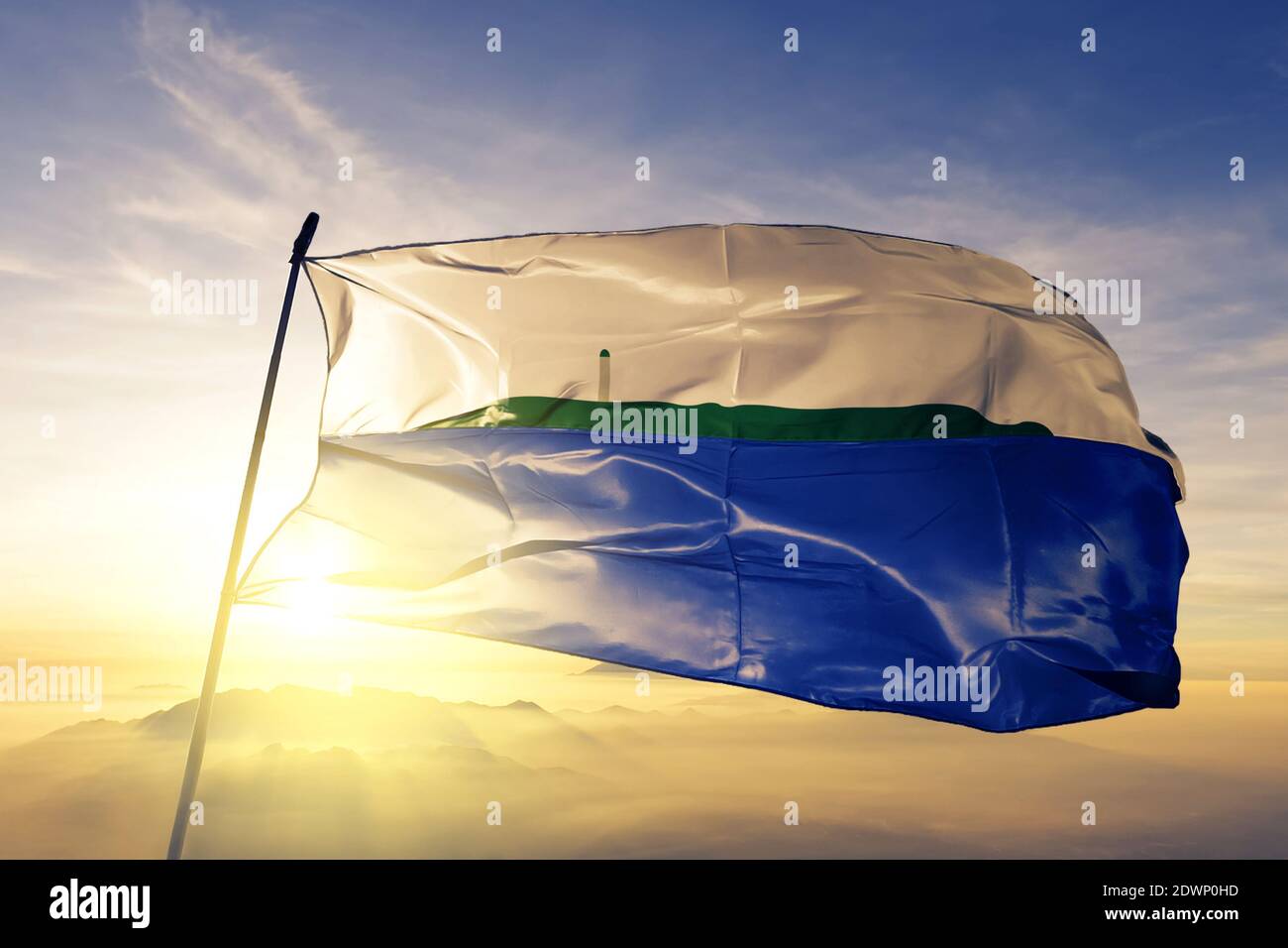Navassa Island flag waving on the top sunrise mist fog Stock Photo - Alamy