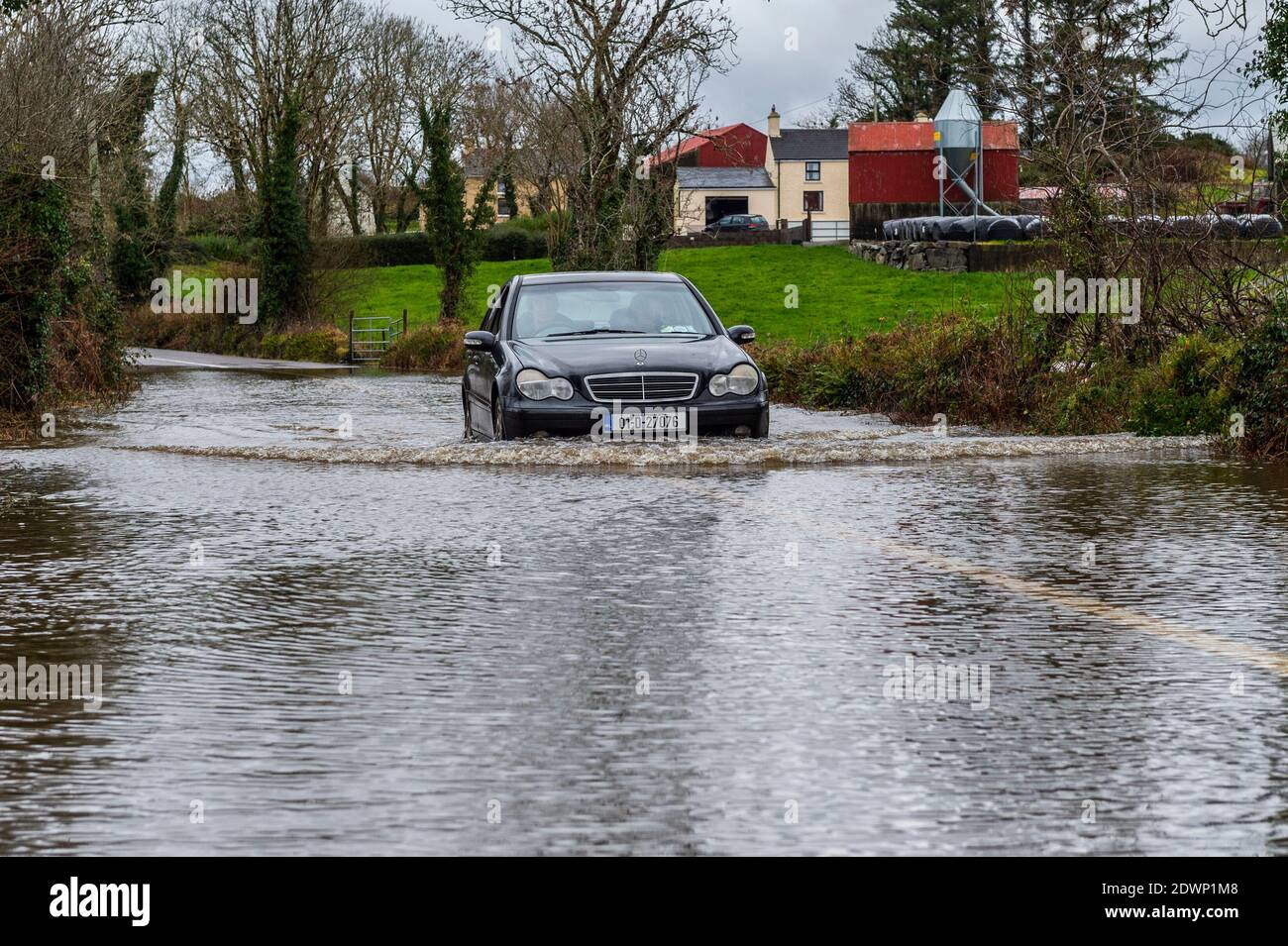River burst banks flooding road hi-res stock photography and images - Alamy