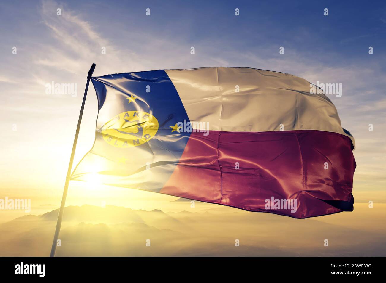 Wake Island flag waving on the top sunrise mist fog Stock Photo - Alamy
