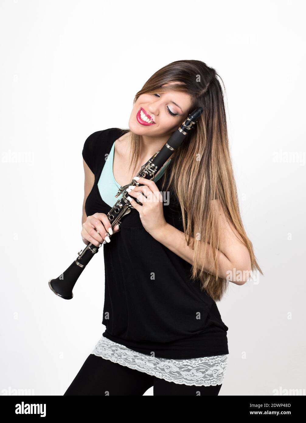 Woman playing clarinet hi-res stock photography and images - Alamy