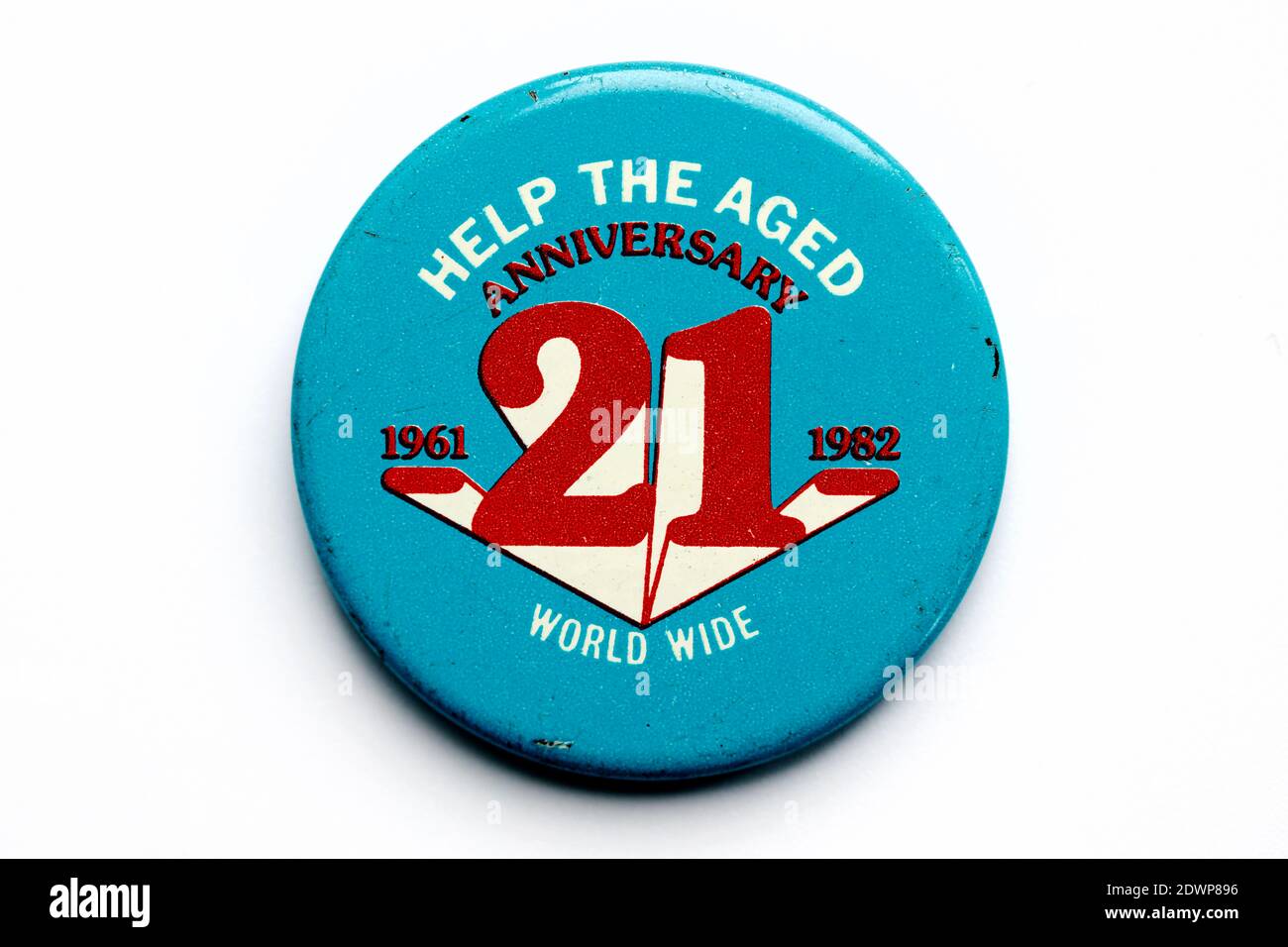 Help The Aged 21st Anniversary Badge Stock Photo - Alamy