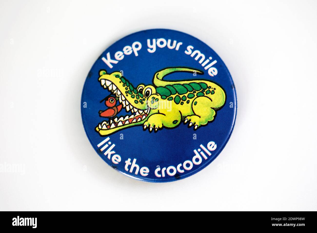 Button Badge "Keep Your Smile Like a Crocodile Stock Photo - Alamy