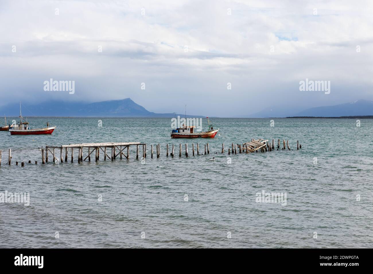 Old Pier (Muelle Histórico), and fishing boats, Puerto Natales ...