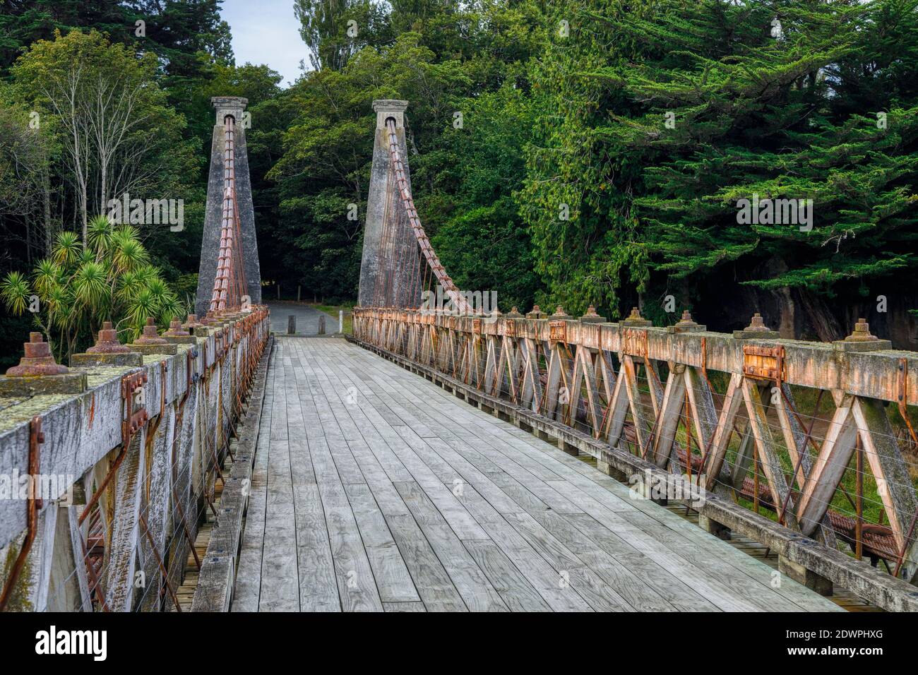 The 1899 Clifden Suspension Bridge spanning the the Waiau River, South ...