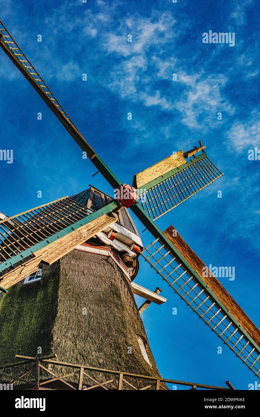 A vertical low angle shot of a windmill in Emden, German Stock Photo ...