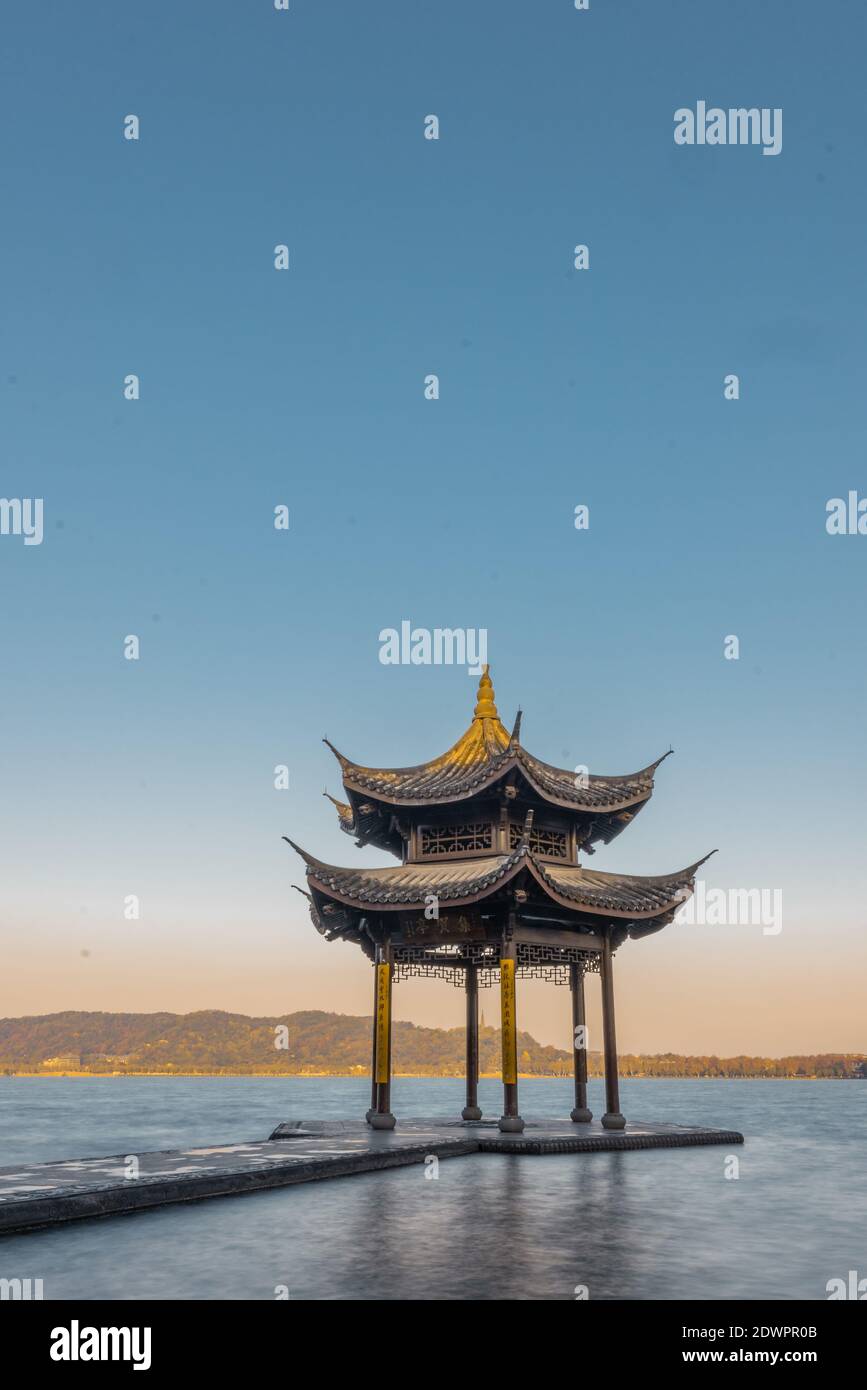 Sunrise view of Jixian pavilion, the historic landmark in at West Lake ...