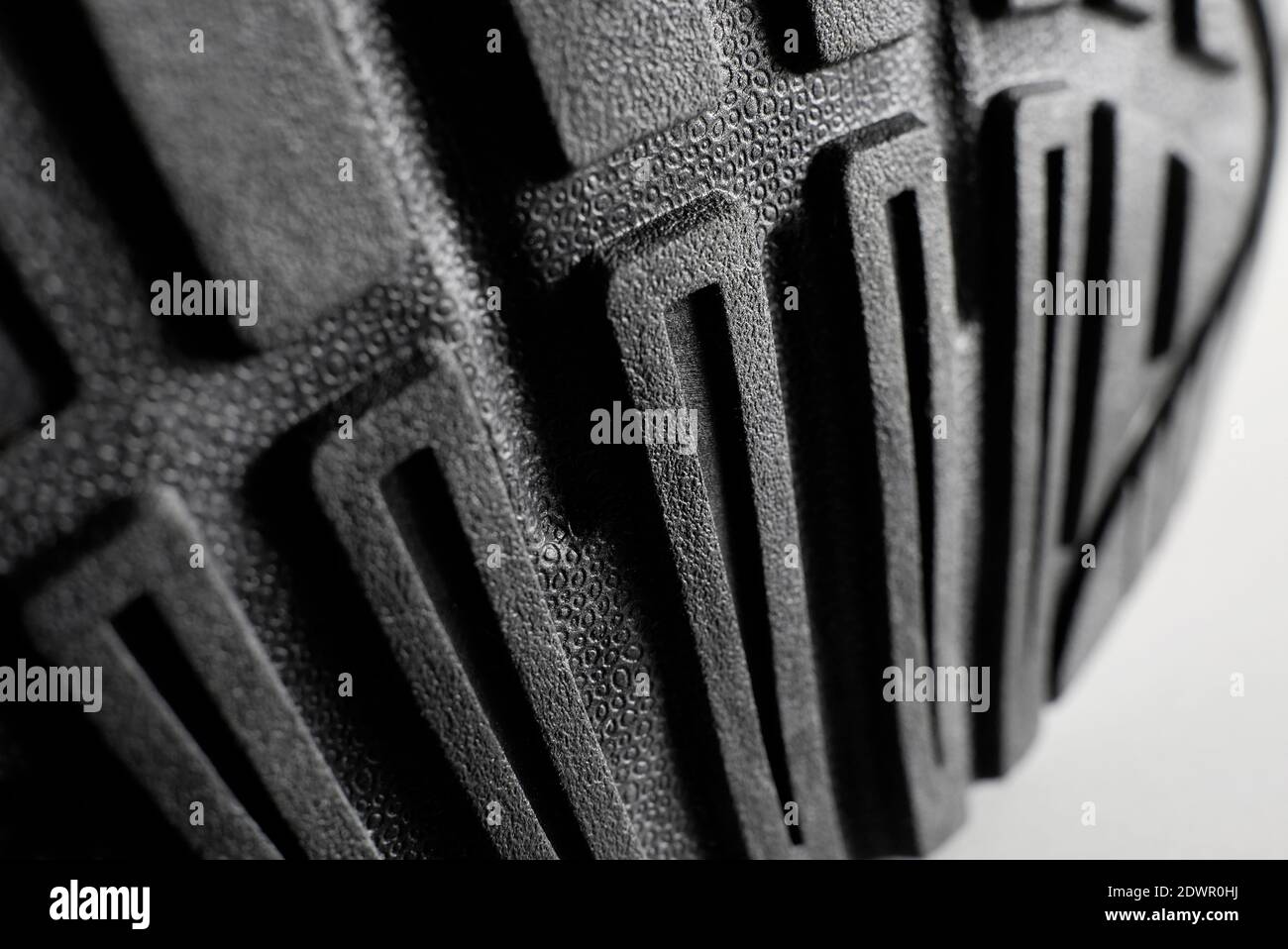 close up of trainer black rubber sole tread Stock Photo - Alamy