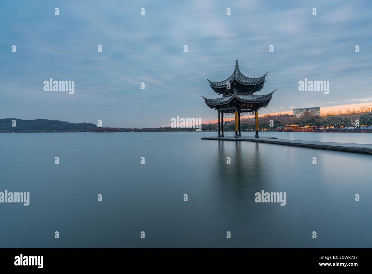 Sunset view of Jixian pavilion, the historic landmark in at West Lake ...