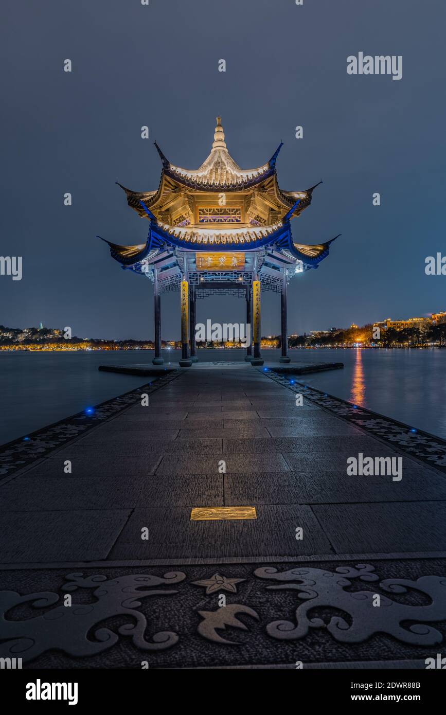 Night view of Jixian pavilion, the historic landmark in at West Lake ...