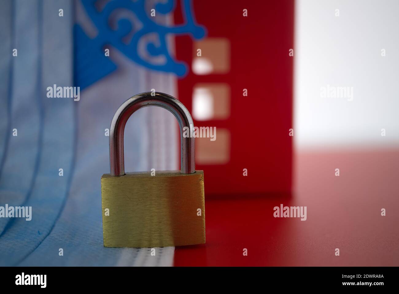 Stay home during the coronavirus epidemic concept with brass padlock ...