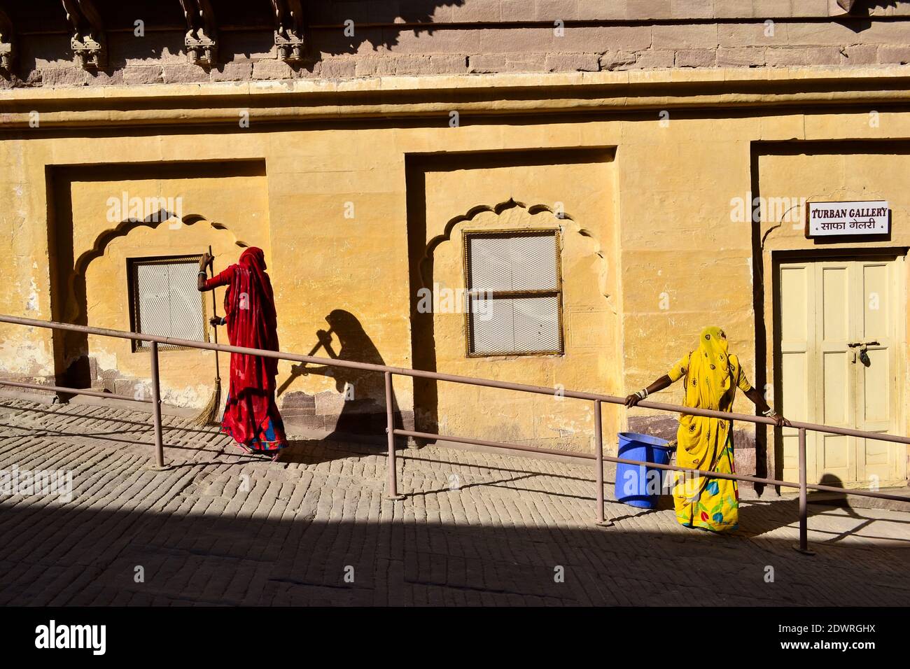 Indian woman sweeping broom in hi-res stock photography and images - Alamy