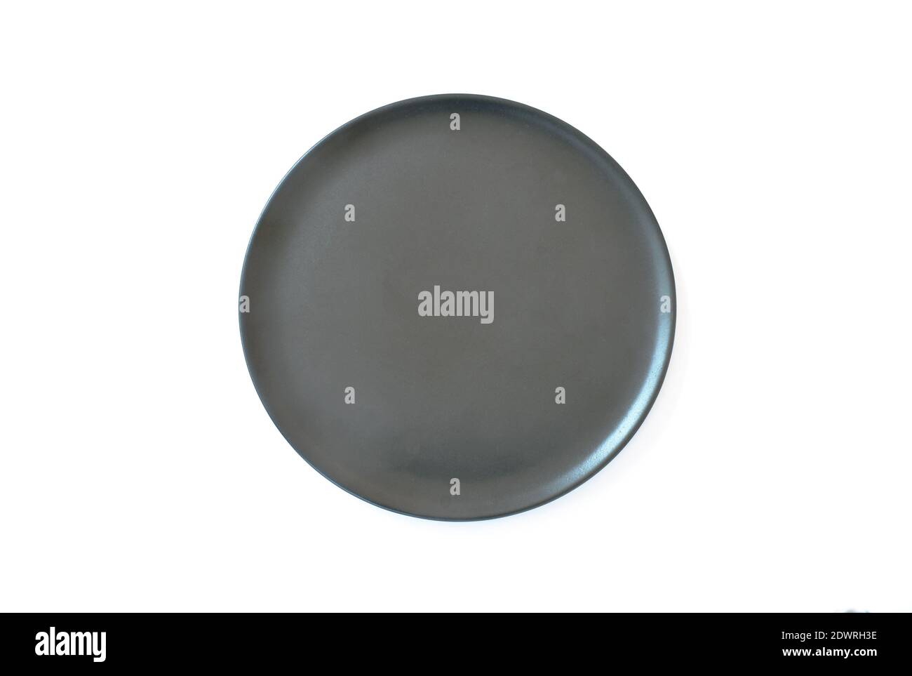 top view of black plate on white background Stock Photo - Alamy