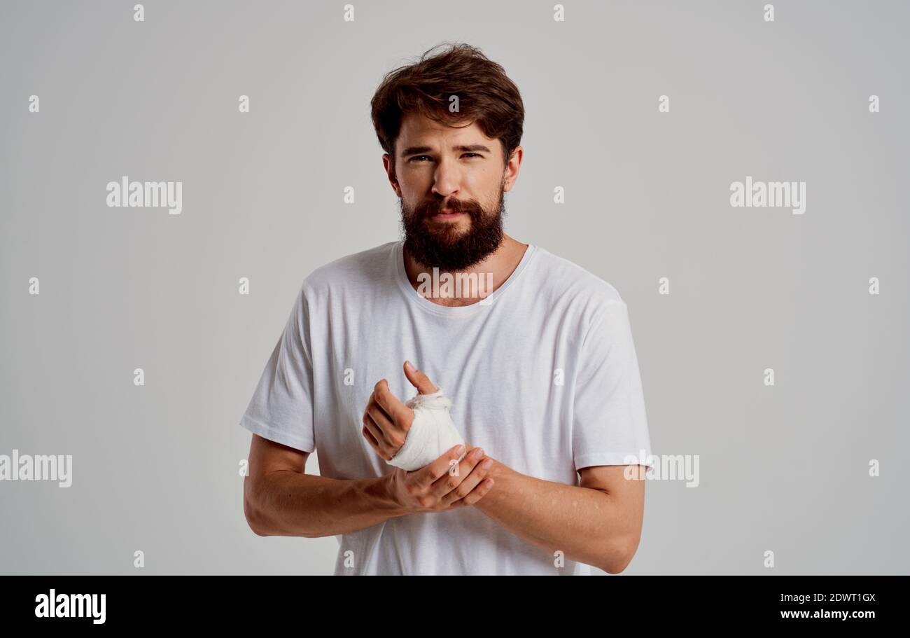 man with bandaged arm injury health problem hospital Stock Photo - Alamy